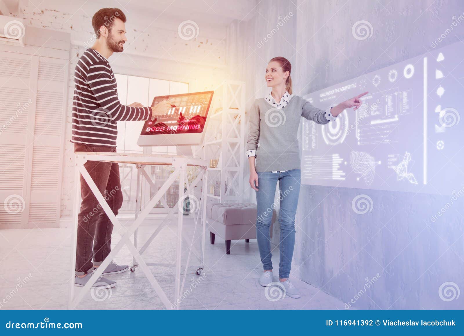 Emotional Software Developers Smiling while Working Together Stock ...