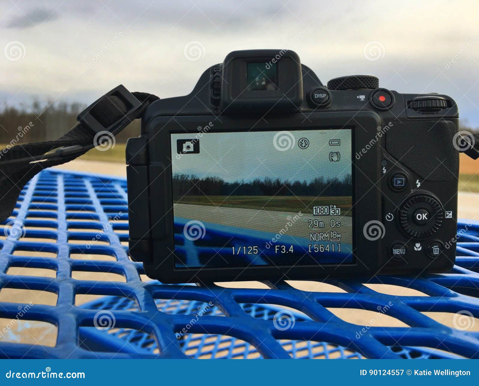 Looking through a lens stock image. Image of photographer - 90124557