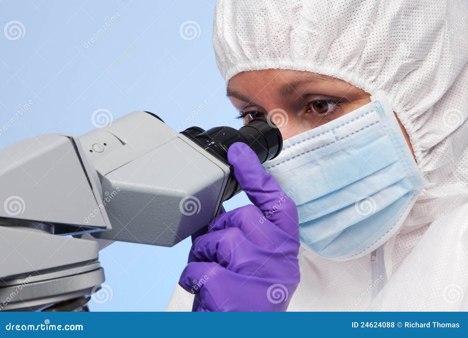 Looking through a Microscope Stock Photo - Image of scientist ...