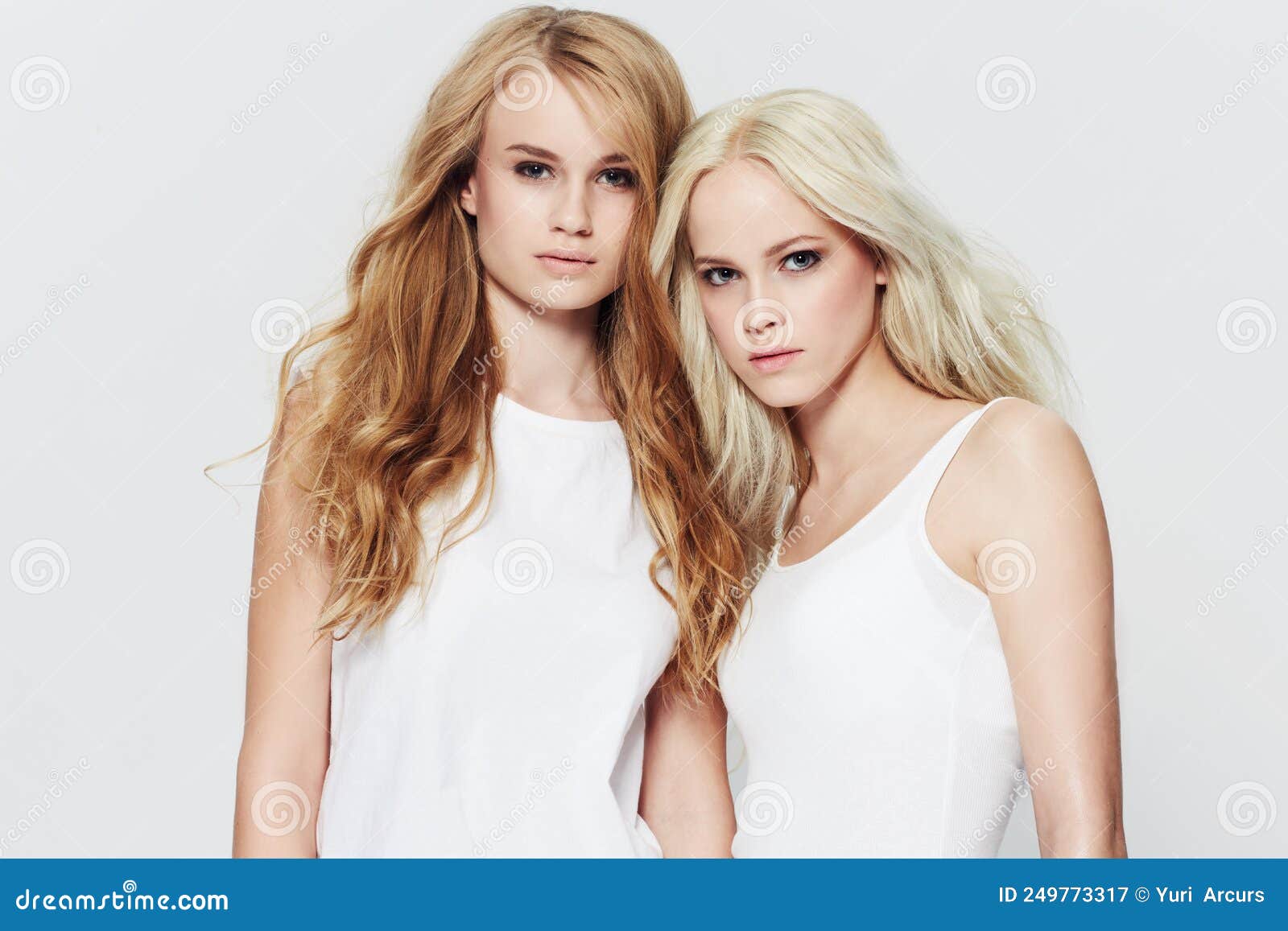 Looking Naturally Beautiful. Studio Portrait of Two Young Models ...