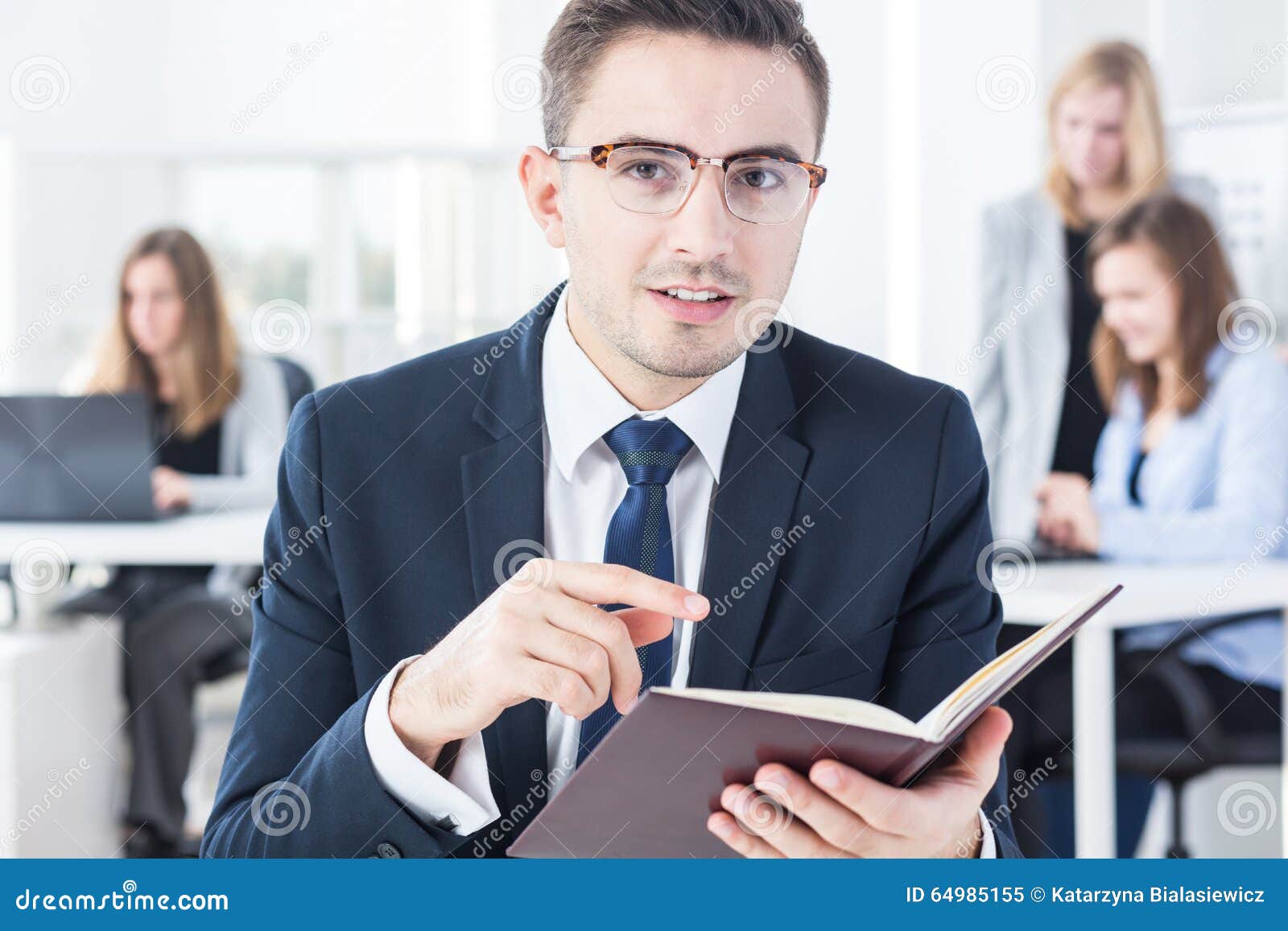 Looking at notes stock image. Image of office, transaction - 64985155