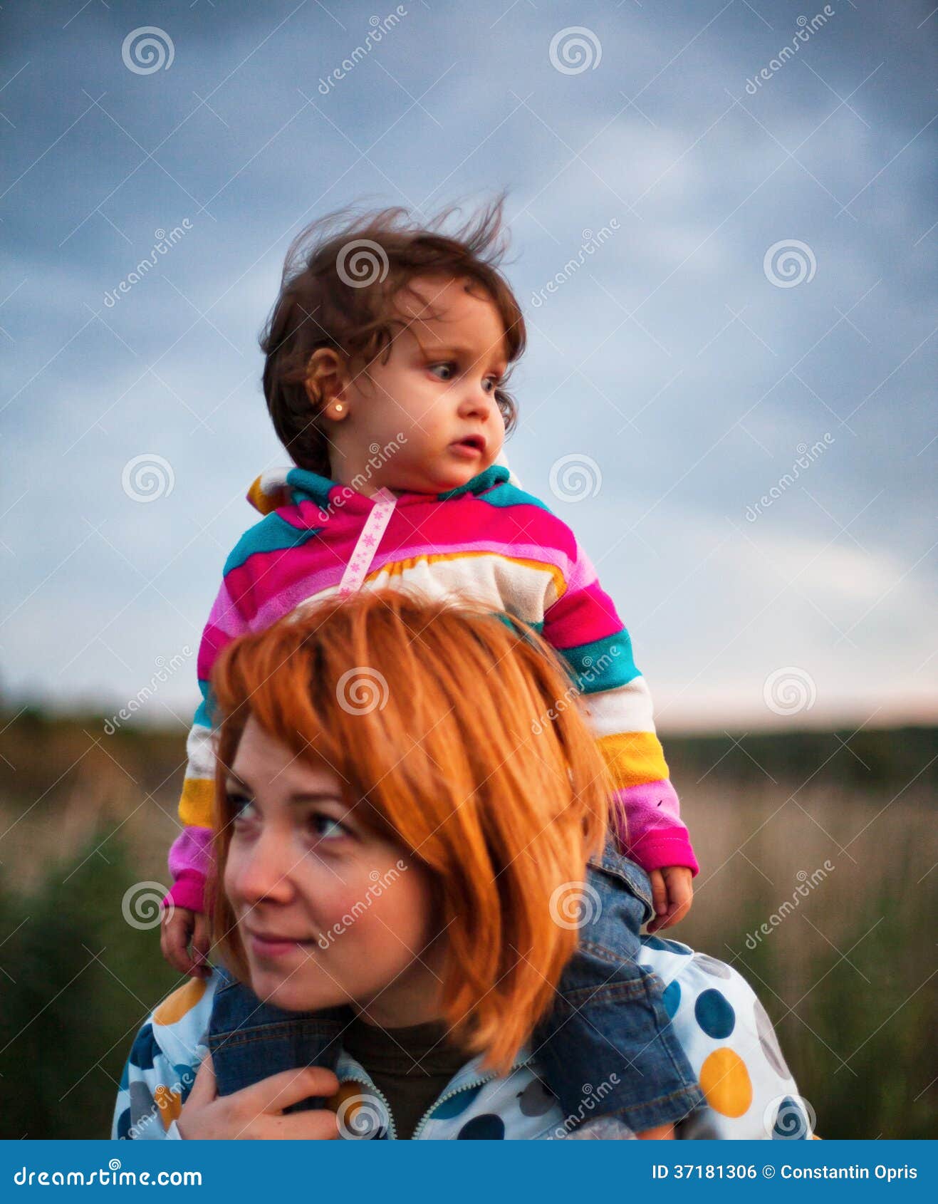 Looking in Opposite Directions Stock Photo - Image of mother ...
