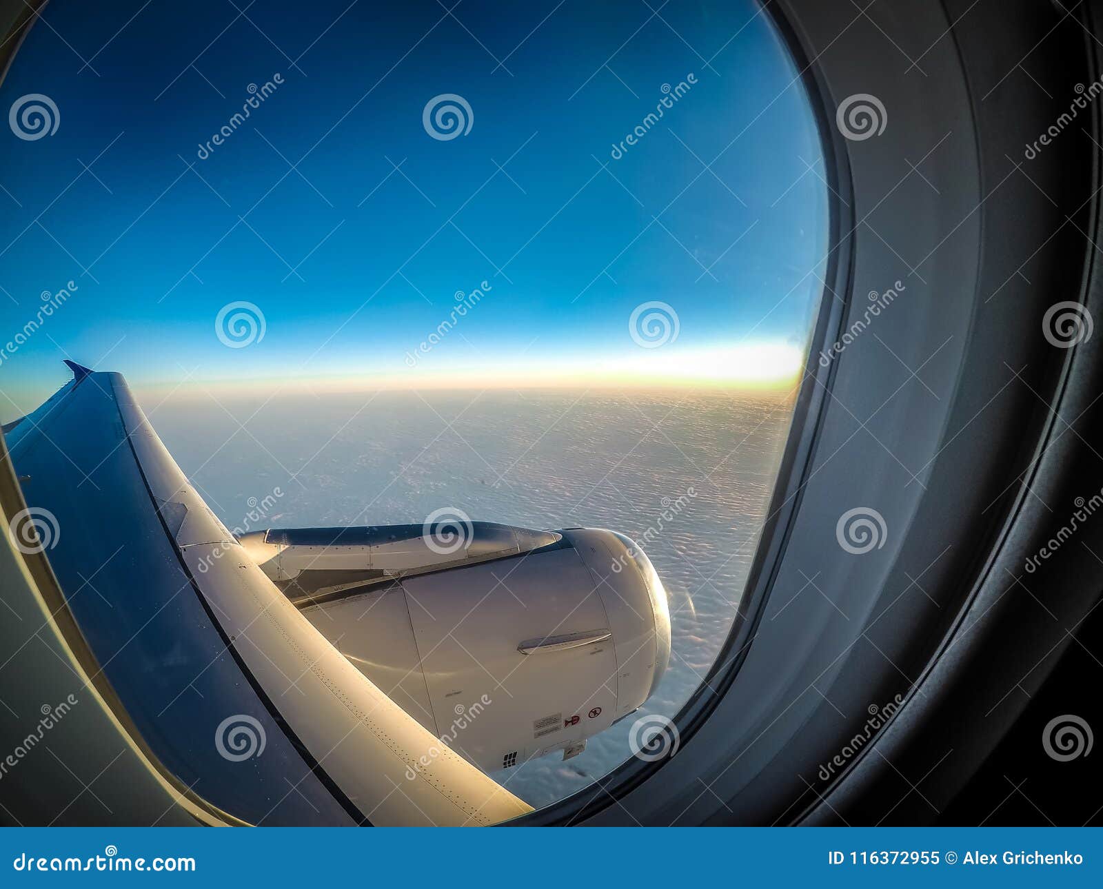 Looking Out Airplane Window and Flying Above the Clouds Stock Image ...