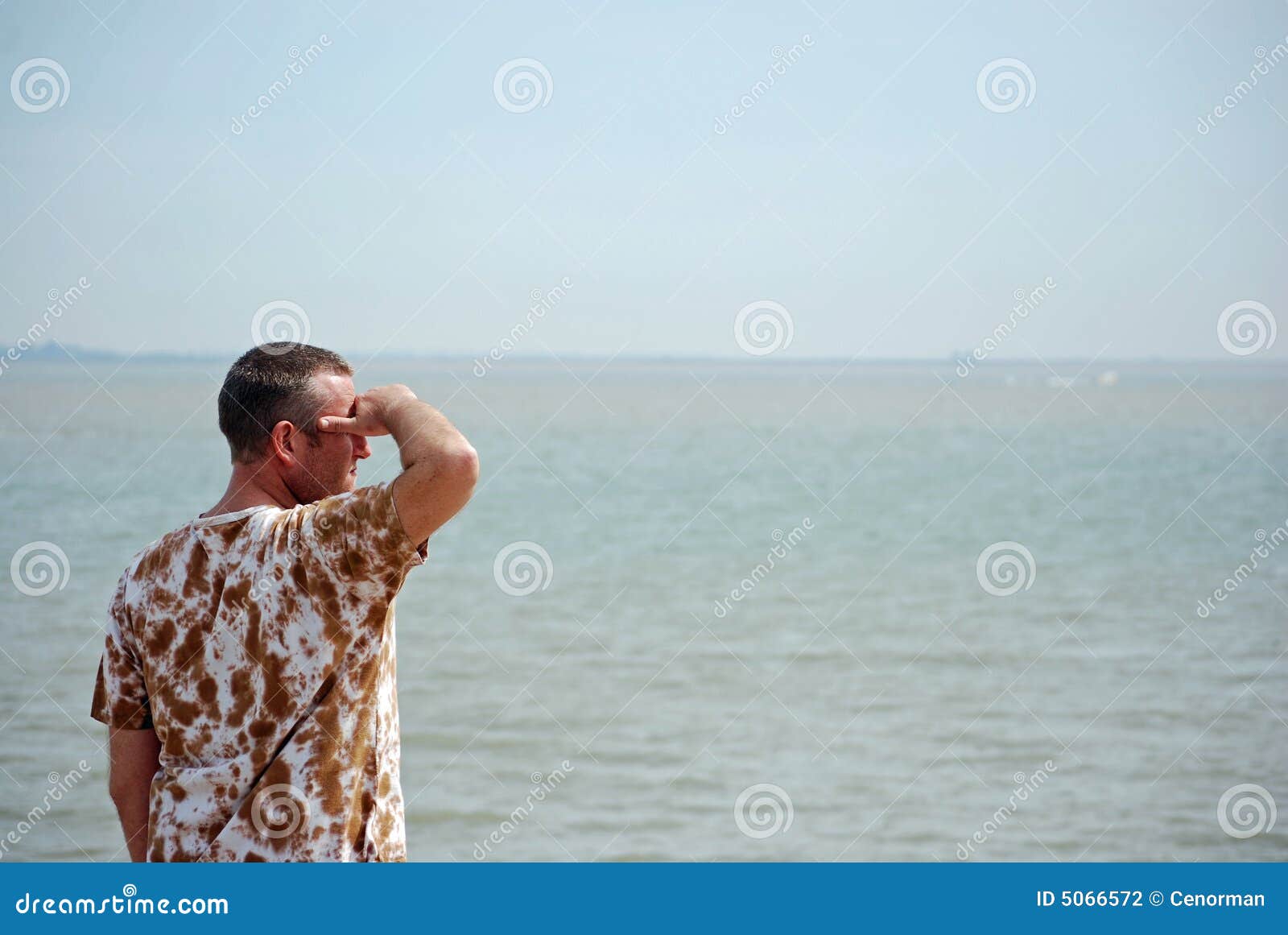 Looking out to a hazy sea stock photo. Image of male, vacation - 5066572