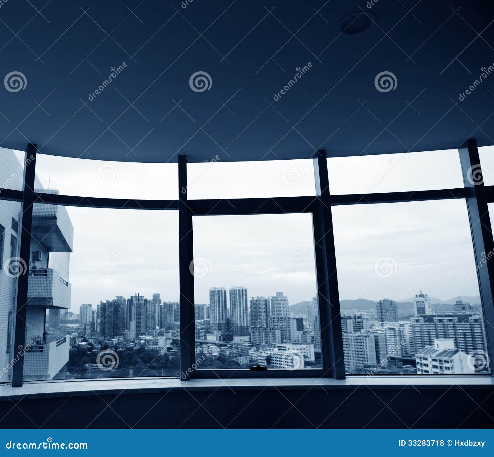 Looking out the window stock photo. Image of highrise - 33283718