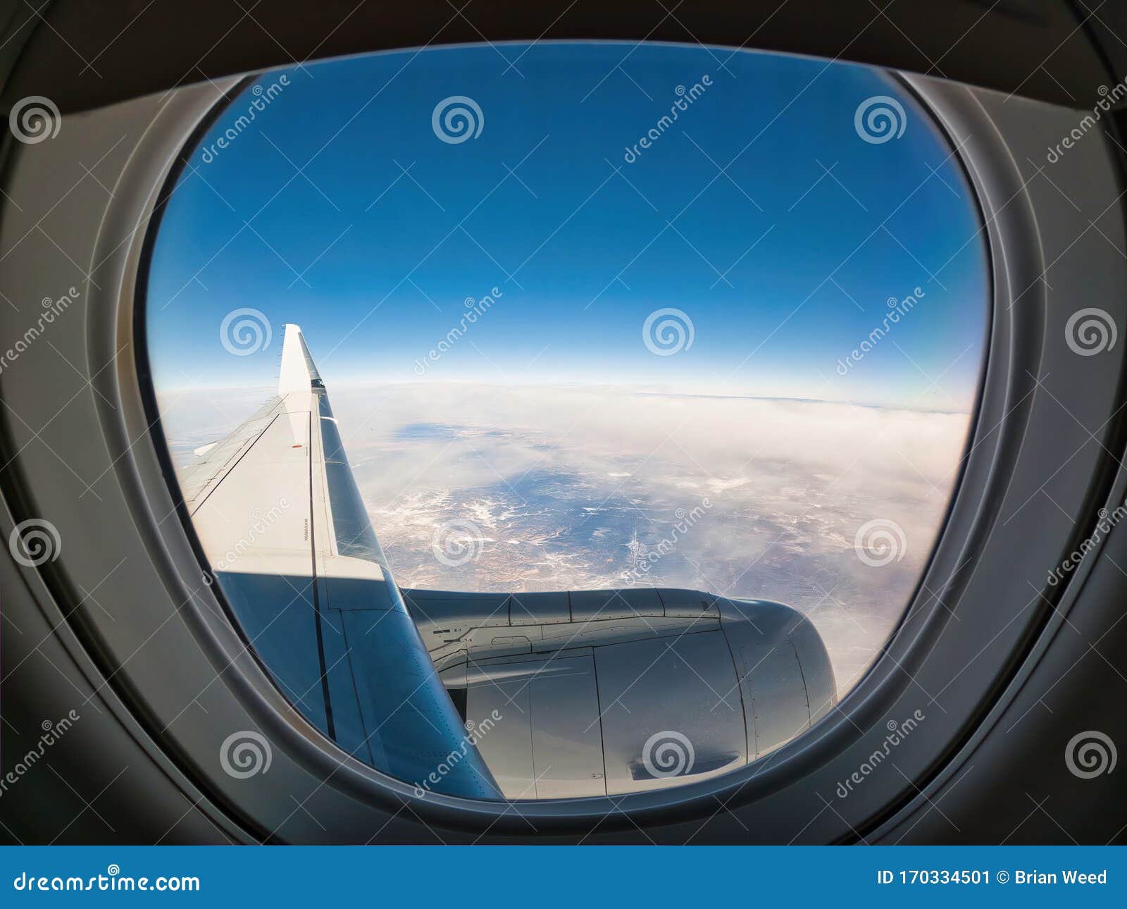Looking Out the Window of a Jet Airplane Over the Wing Stock Image ...