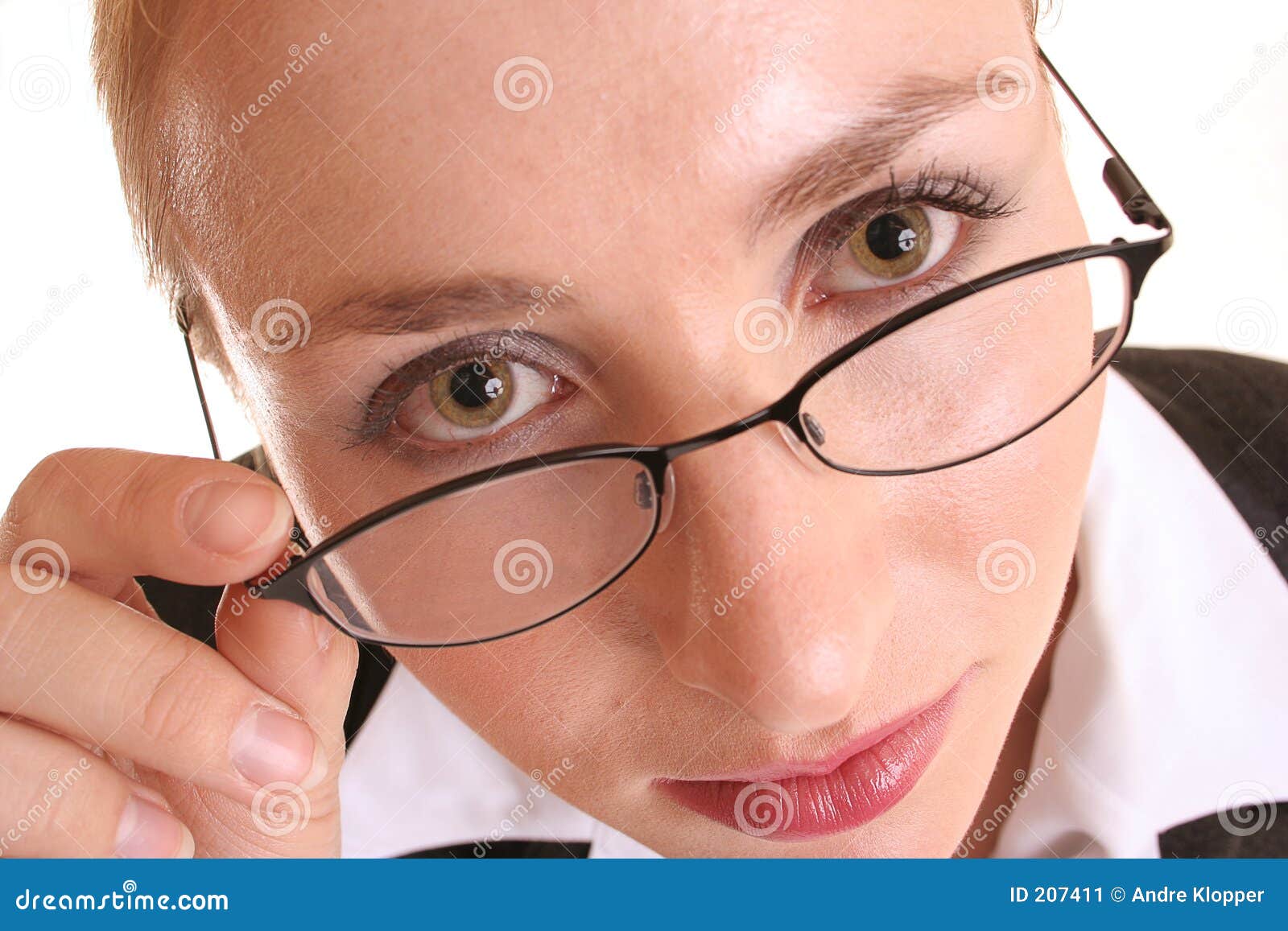 Looking over glasses stock image. Image of face, spectacles - 207411