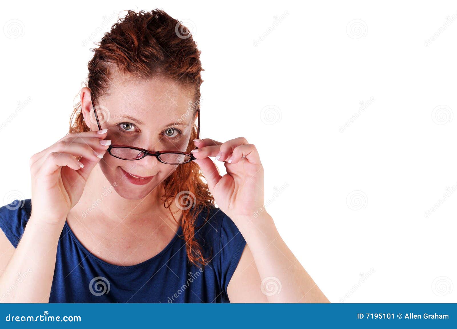 Looking over the glasses stock image. Image of redhead - 7195101