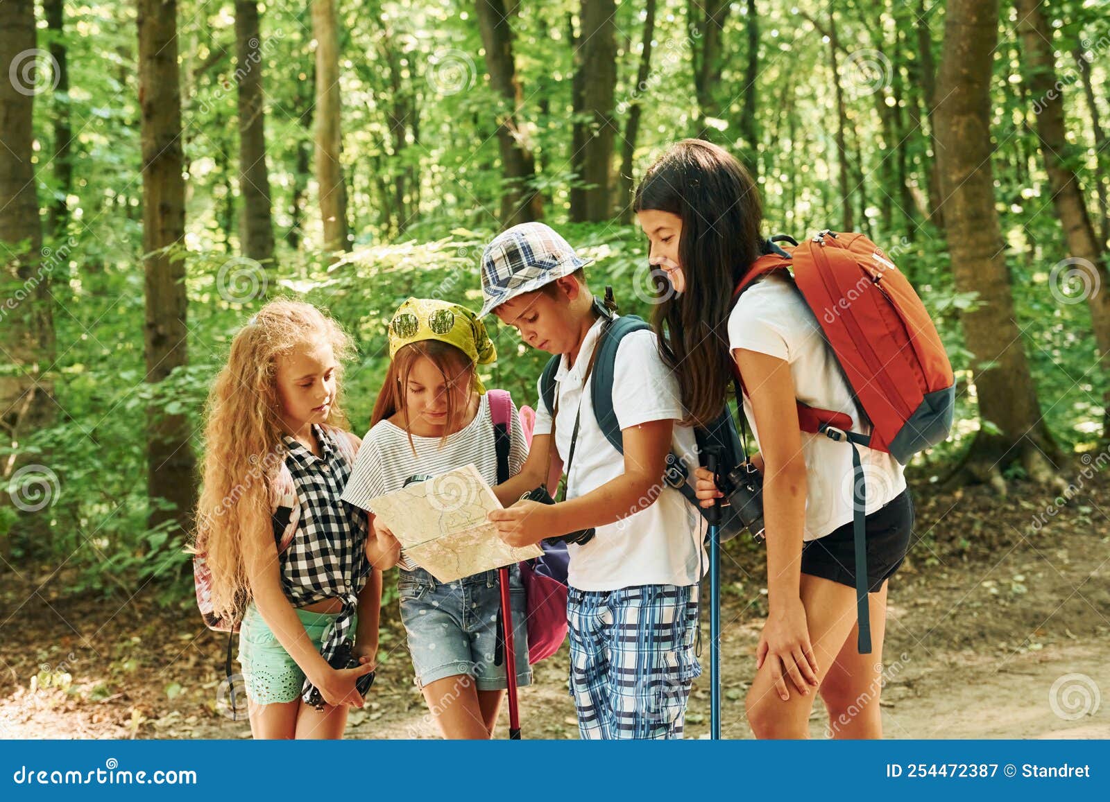 Looking for a Path. Kids Strolling in the Forest with Travel Equipment ...