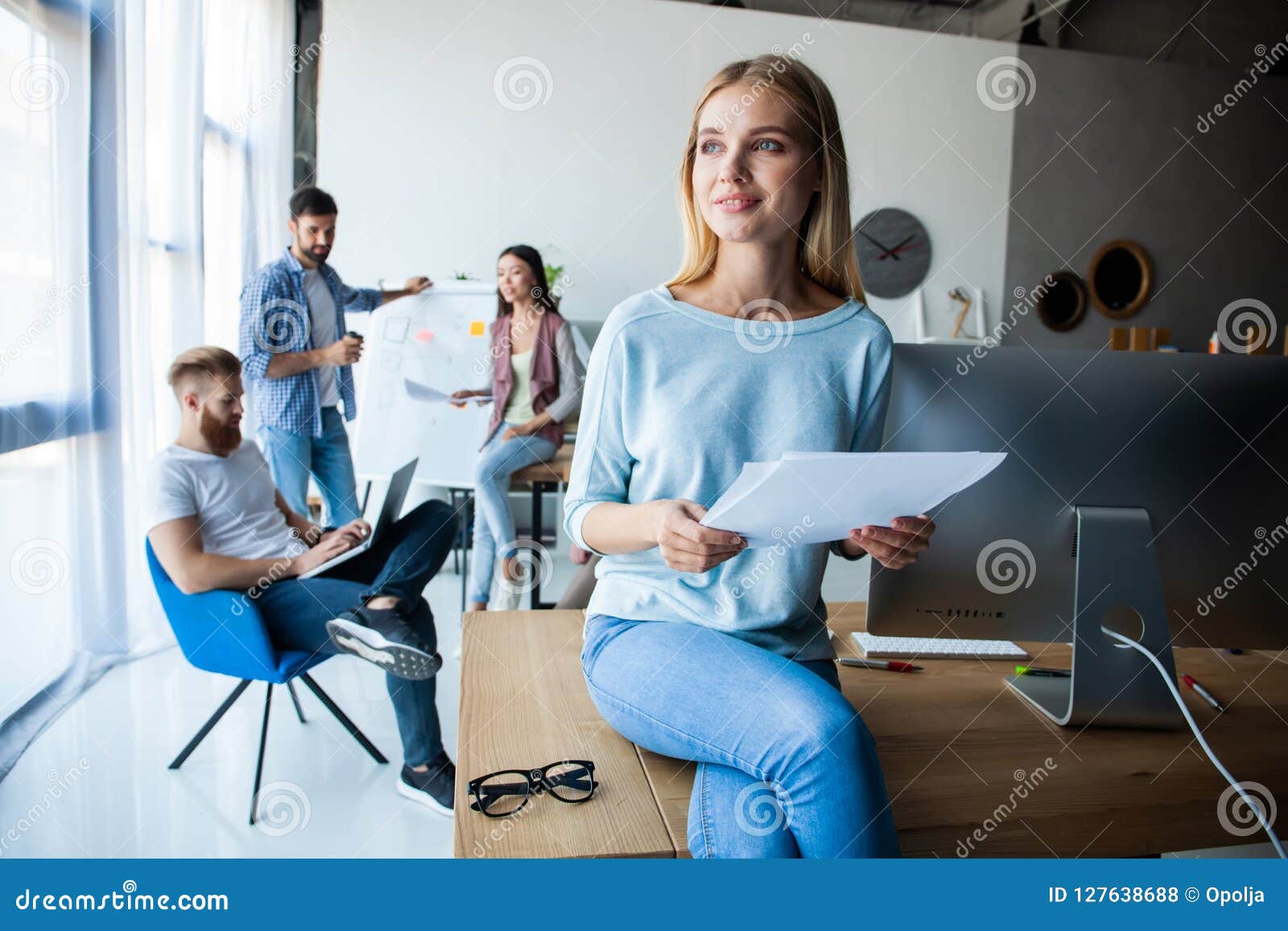 Looking for the Right Document. Beautiful Young Woman Examining ...