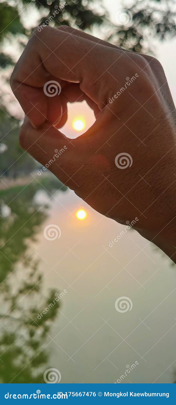 Looking at the Sun through the Hands Stock Photo - Image of finger ...