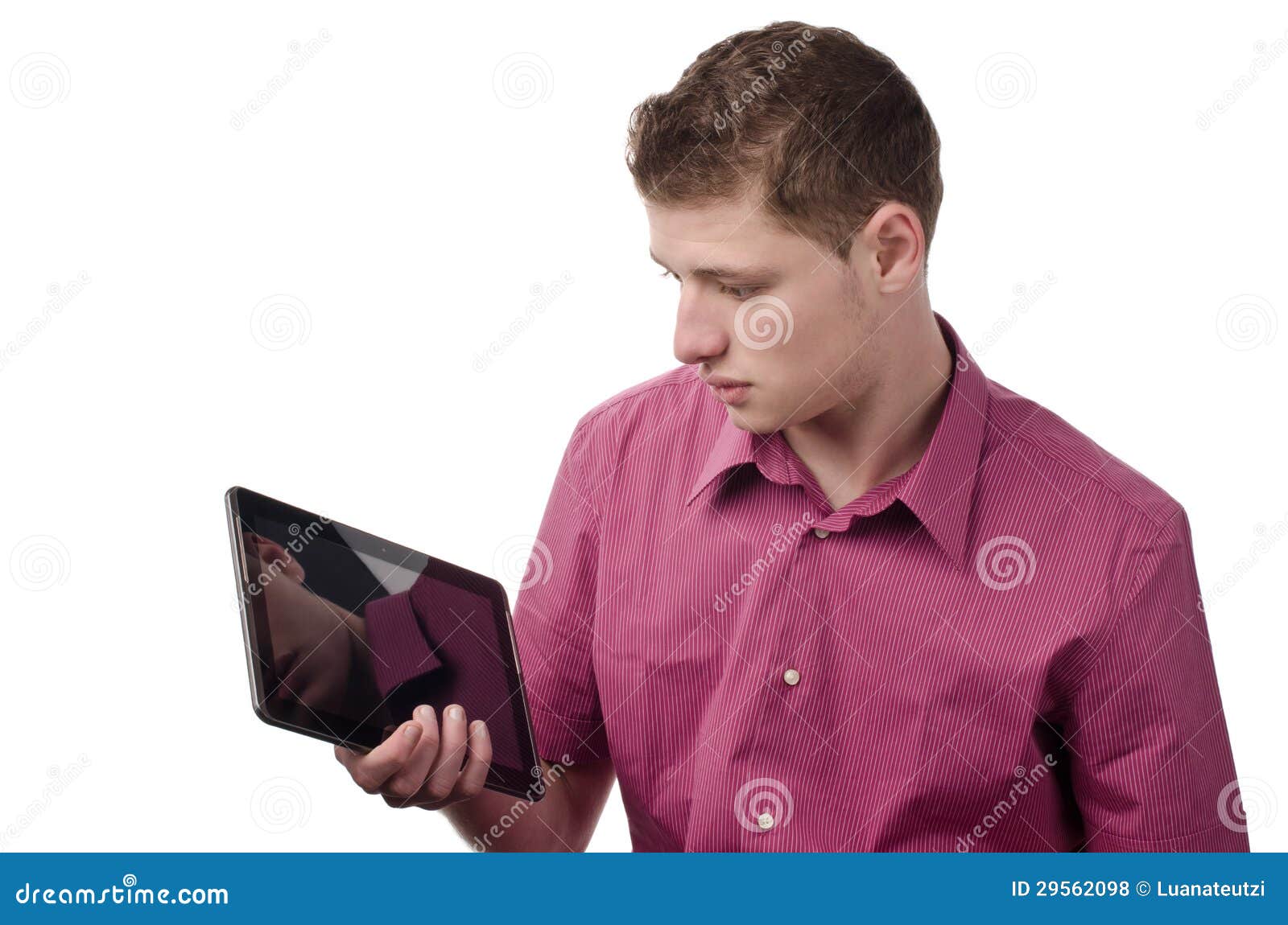 Looking at the tablet. stock photo. Image of expression - 29562098