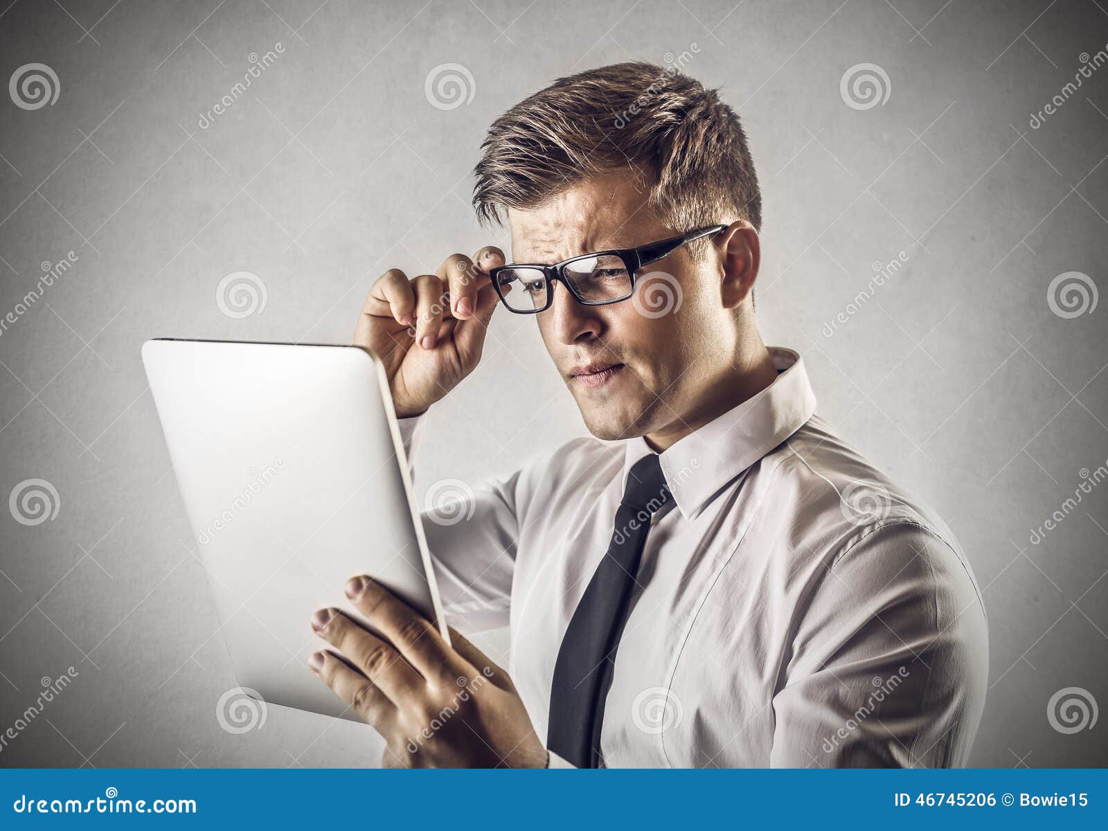 Looking on the tablet stock photo. Image of touchscreen - 46745206