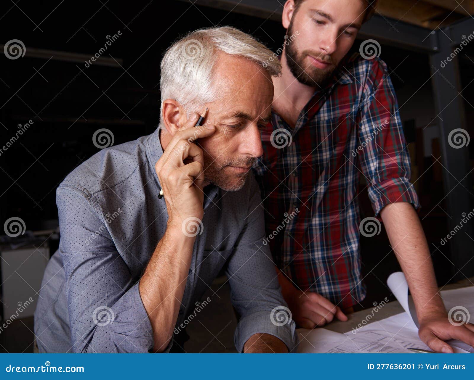 Looking at Things from a Different Angle. Two Architects Working ...