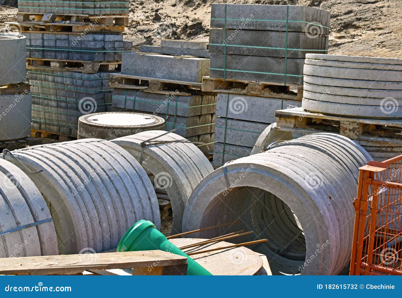 Concrete Rings on a Construction Site with Material, Gully Covers and ...