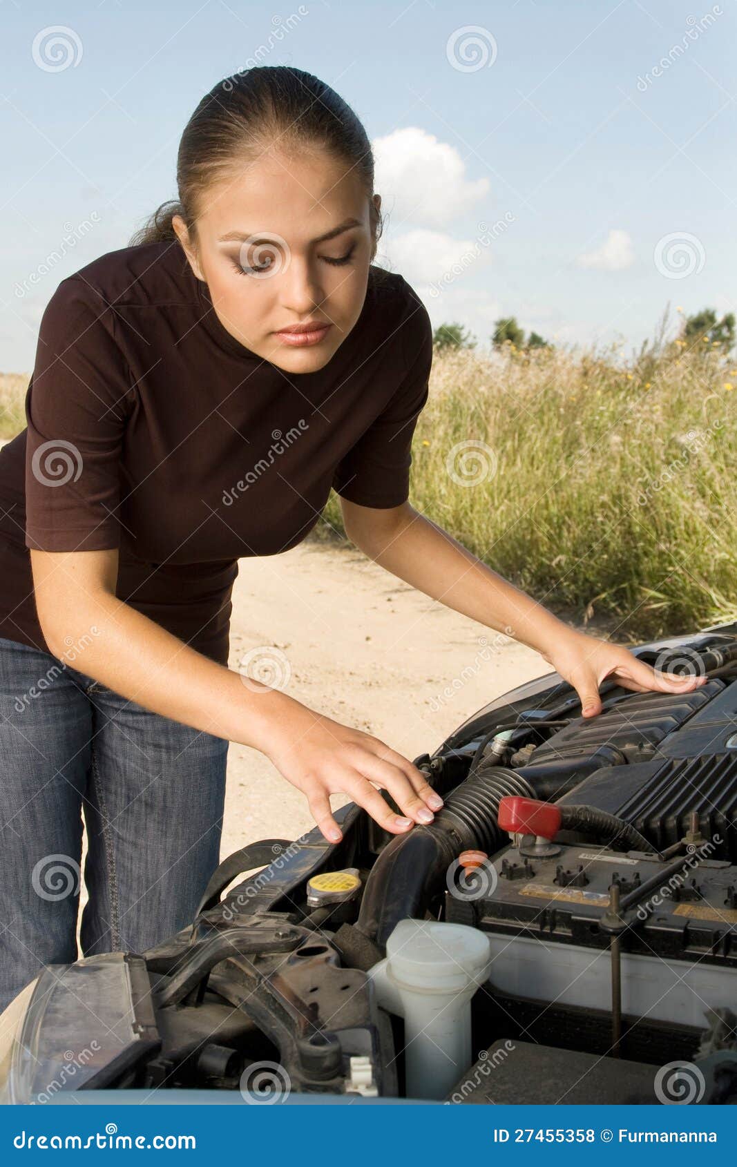 Looking under bonnet. stock photo. Image of person, brown - 27455358