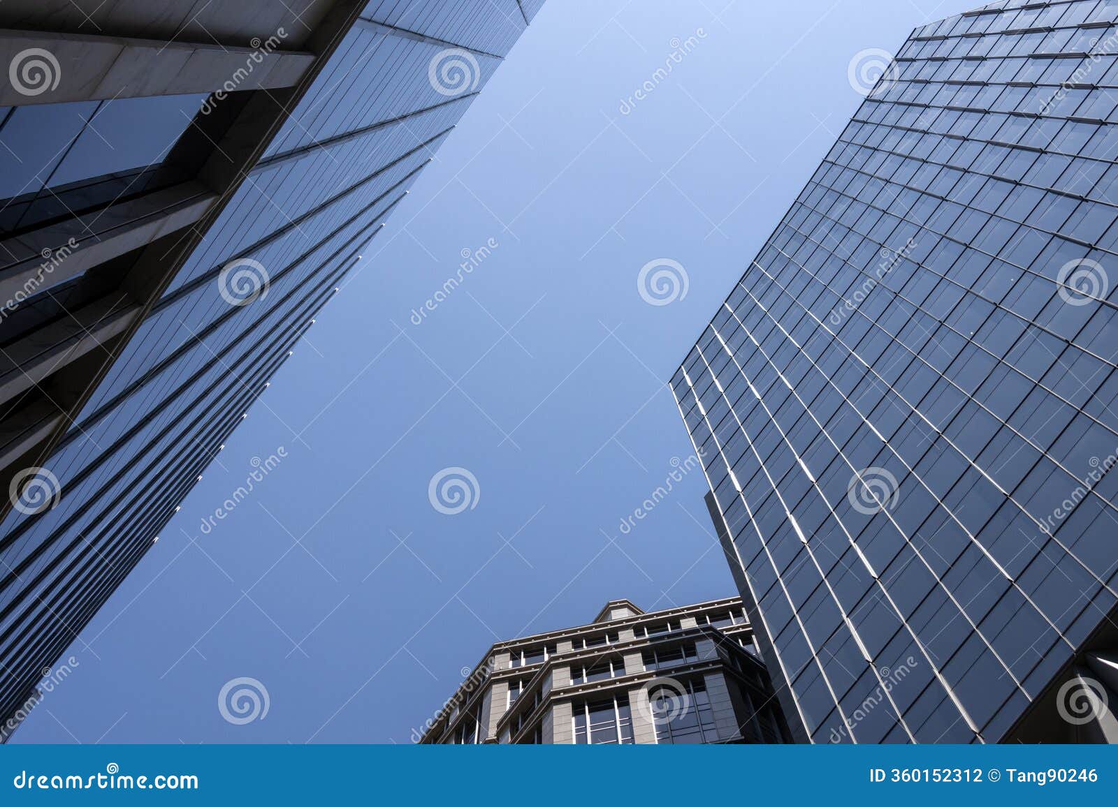 Looking Up Modern High-rise Office Buildings with Blue Sky Stock Photo ...