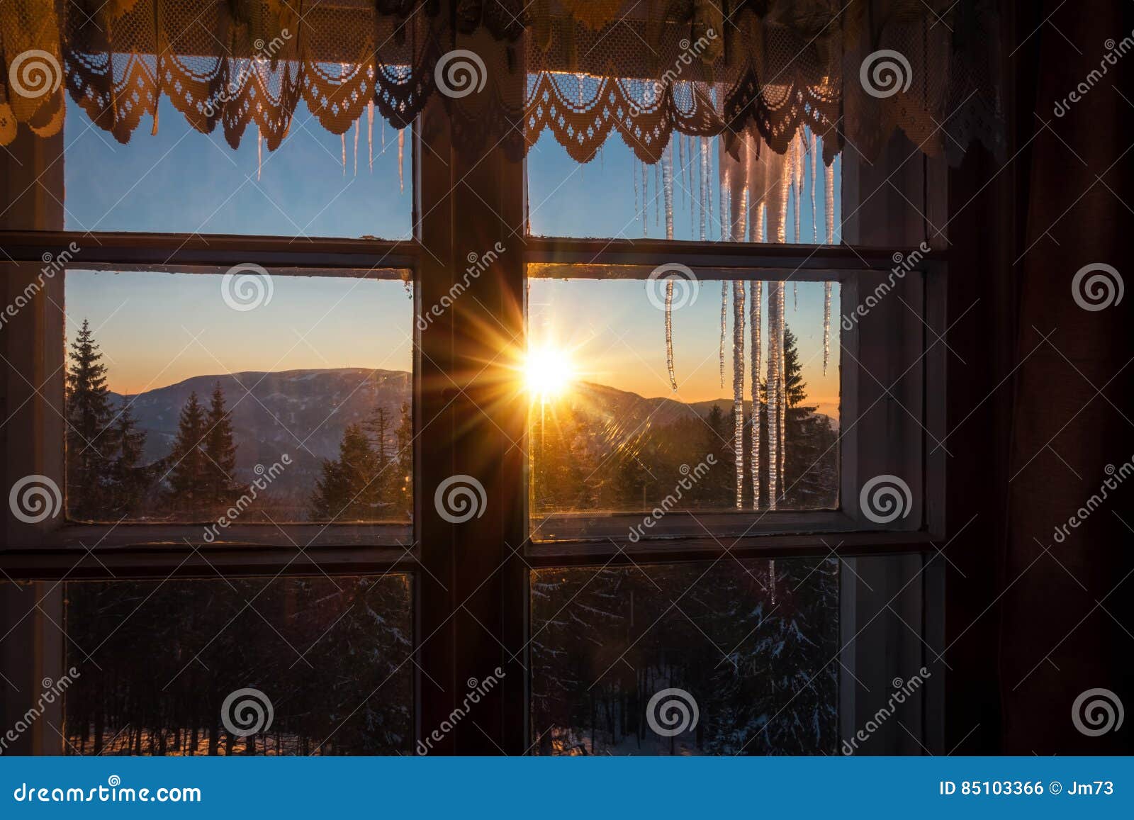 Looking through Window at Mountain Winter Sunset Stock Photo - Image of ...