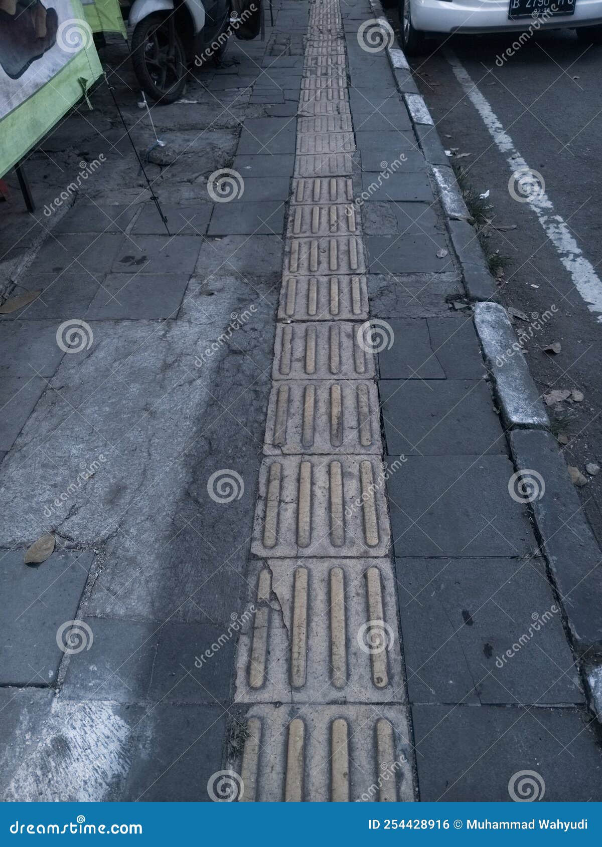 Looks Like a Broken Sidewalk Around the Road Stock Photo - Image of ...