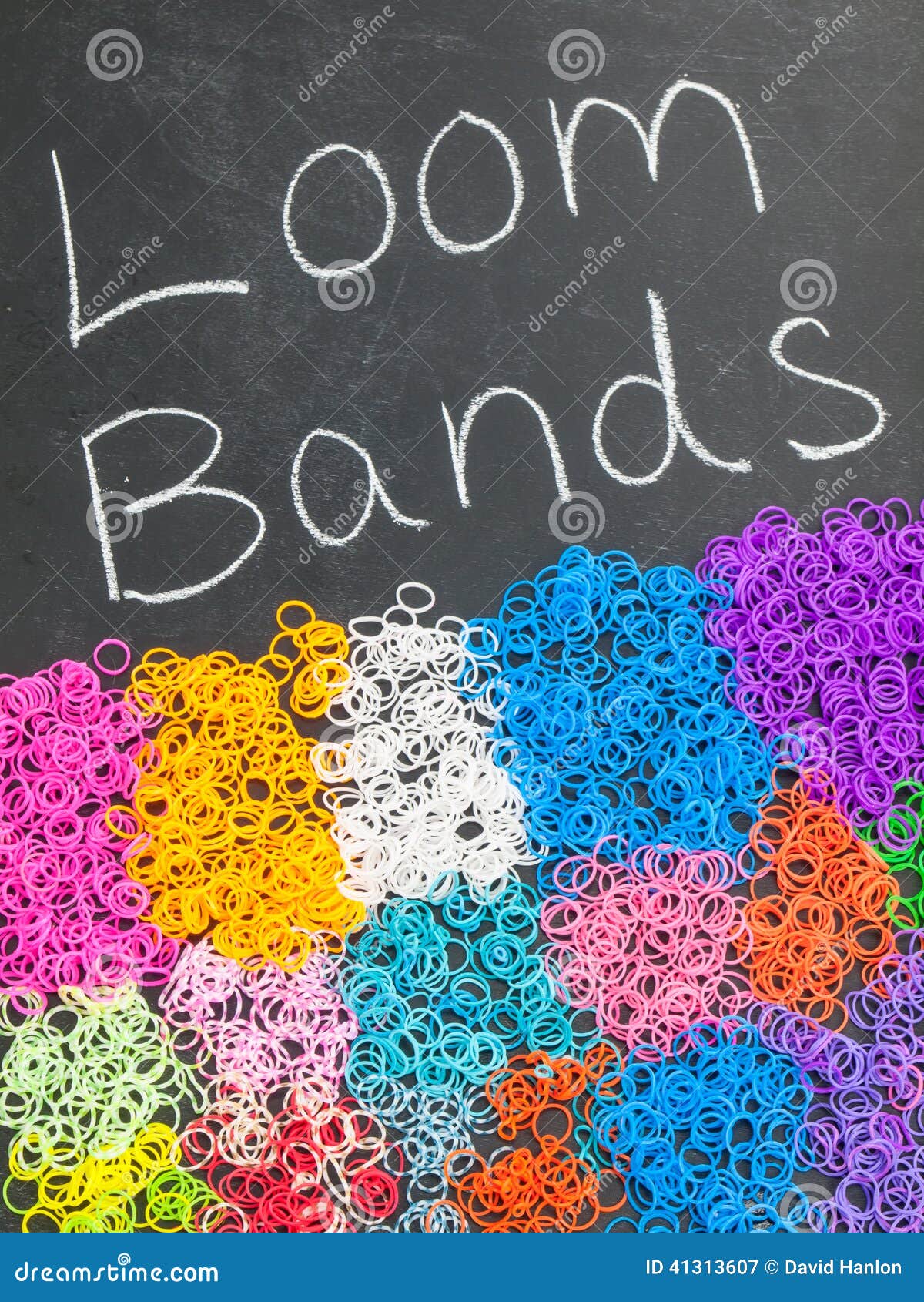 Loom bands on a blackboard stock image. Image of elastics - 41313607