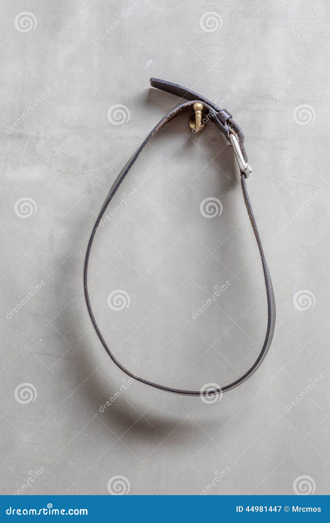 The Loop of Black Leather Belt is Hanging on Exposed Concrete W Stock ...