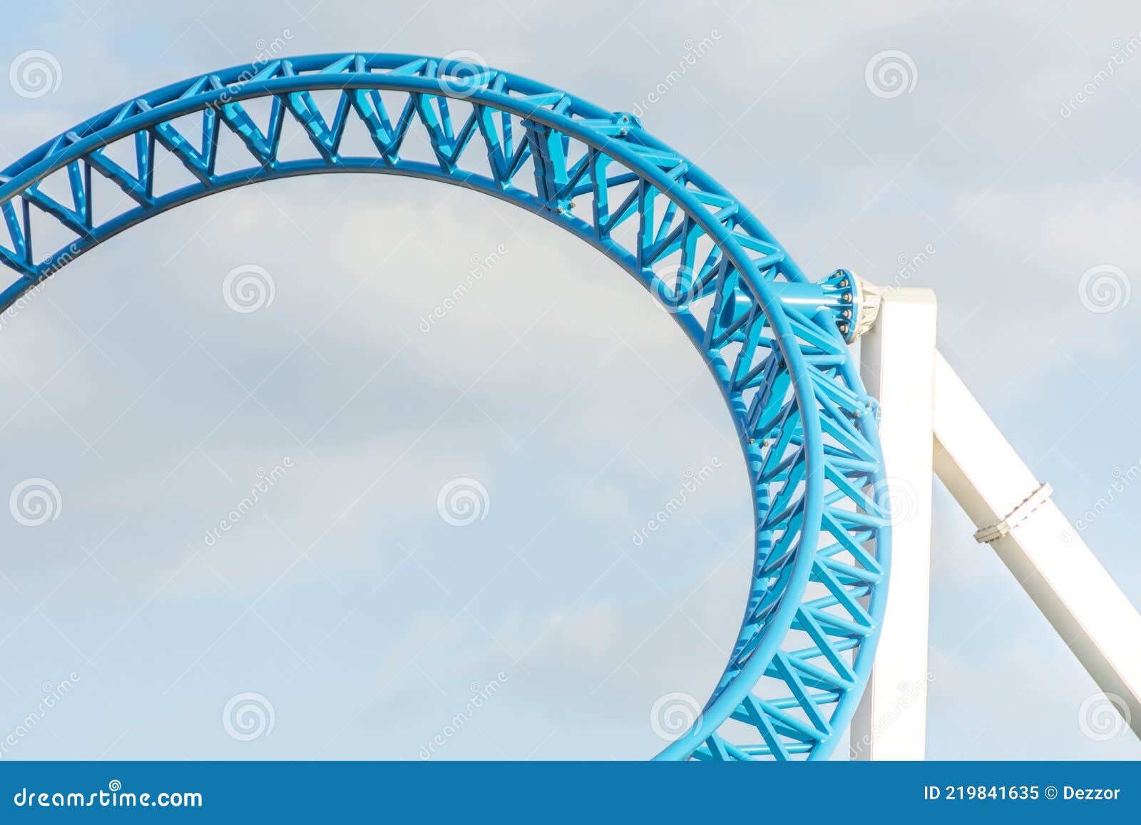 Loop and Turn on Blue Color Roller Coaster in an Amusement Park Stock ...