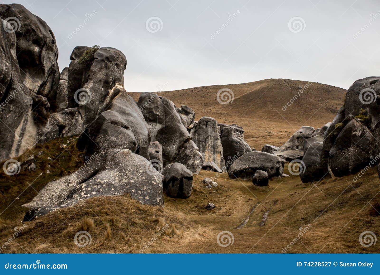 Lord of the Rings Rocks stock image. Image of rocks, grass - 74228527