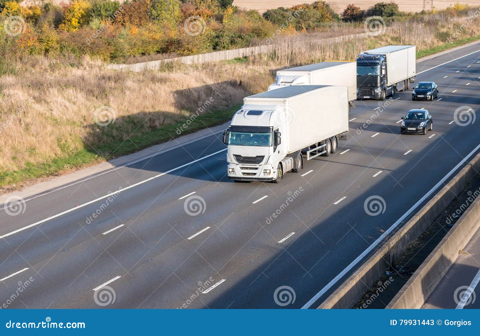 Lorries on the motorway stock image. Image of industry - 79931443