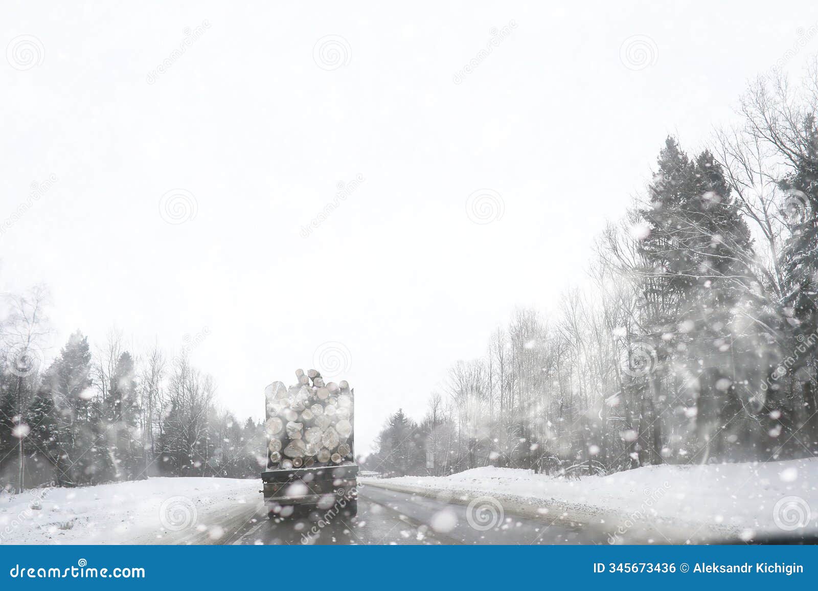 A Lorry Transports Log in the Back. Timber Truck Stock Photo - Image of ...