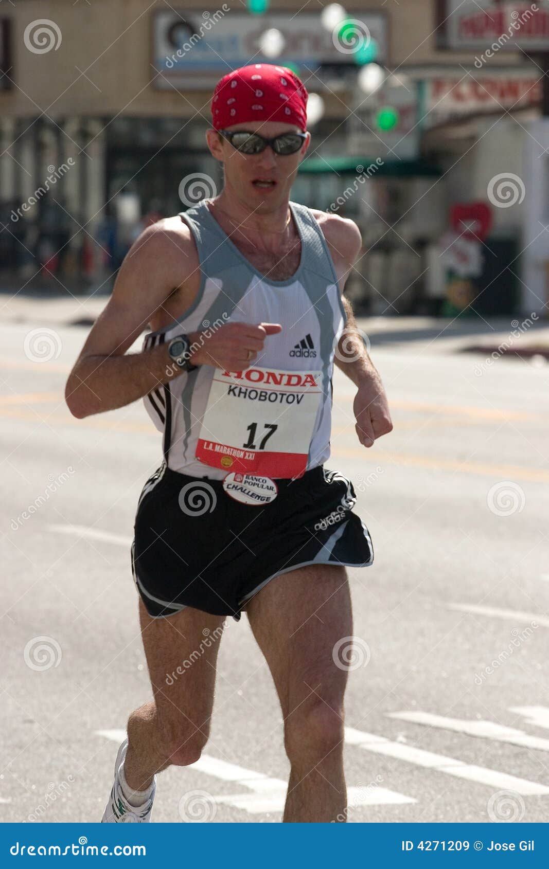 Marathon Runner Picking Up Water At Service Point Editorial Image ...