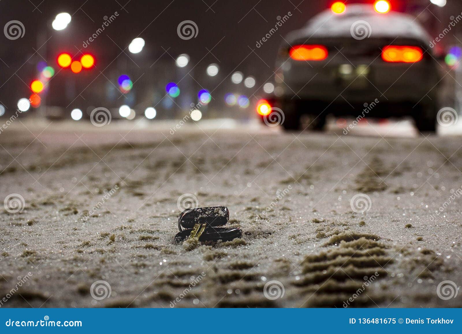 Lost Car Keys on the Road Powdered with the First Snow at Night. on ...