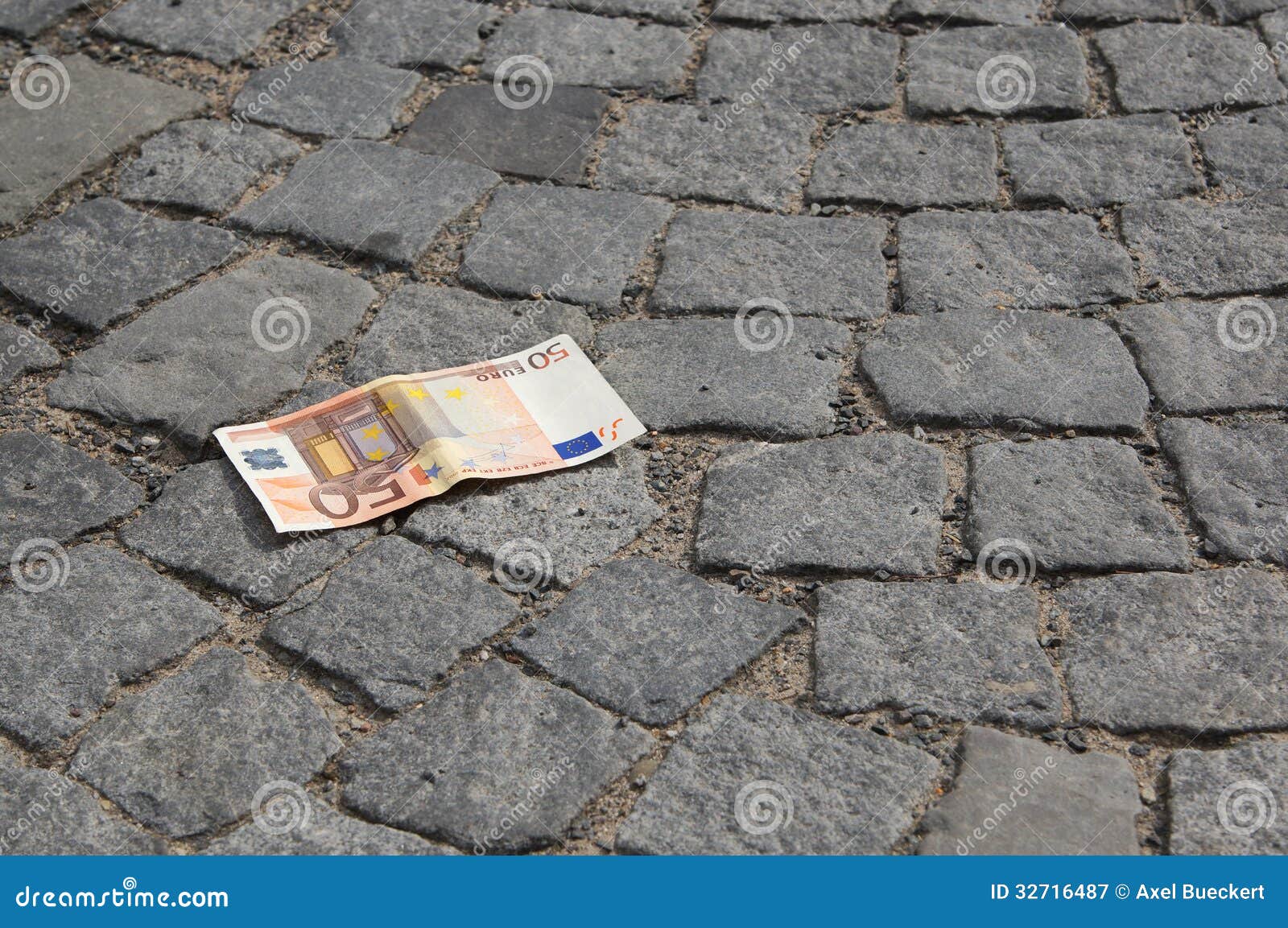 Lost cash stock image. Image of cobbled, lost, street - 32716487