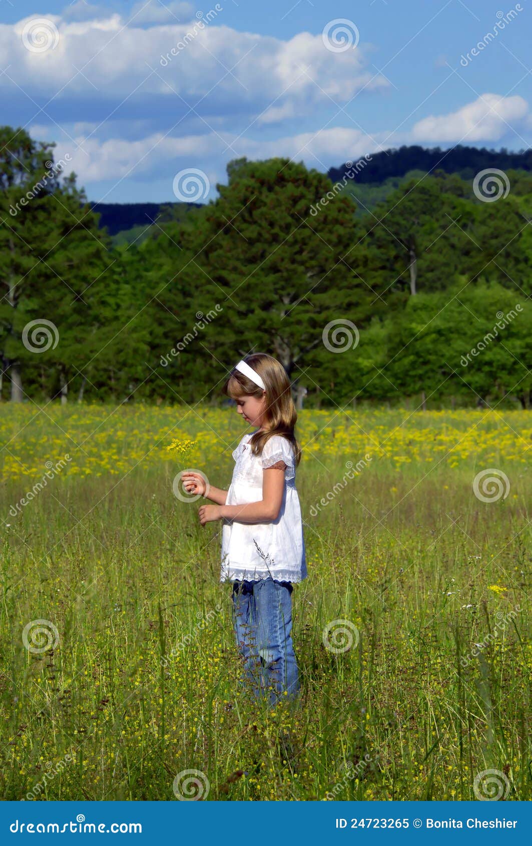 Lost in Her Own World stock image. Image of holding, looking - 24723265