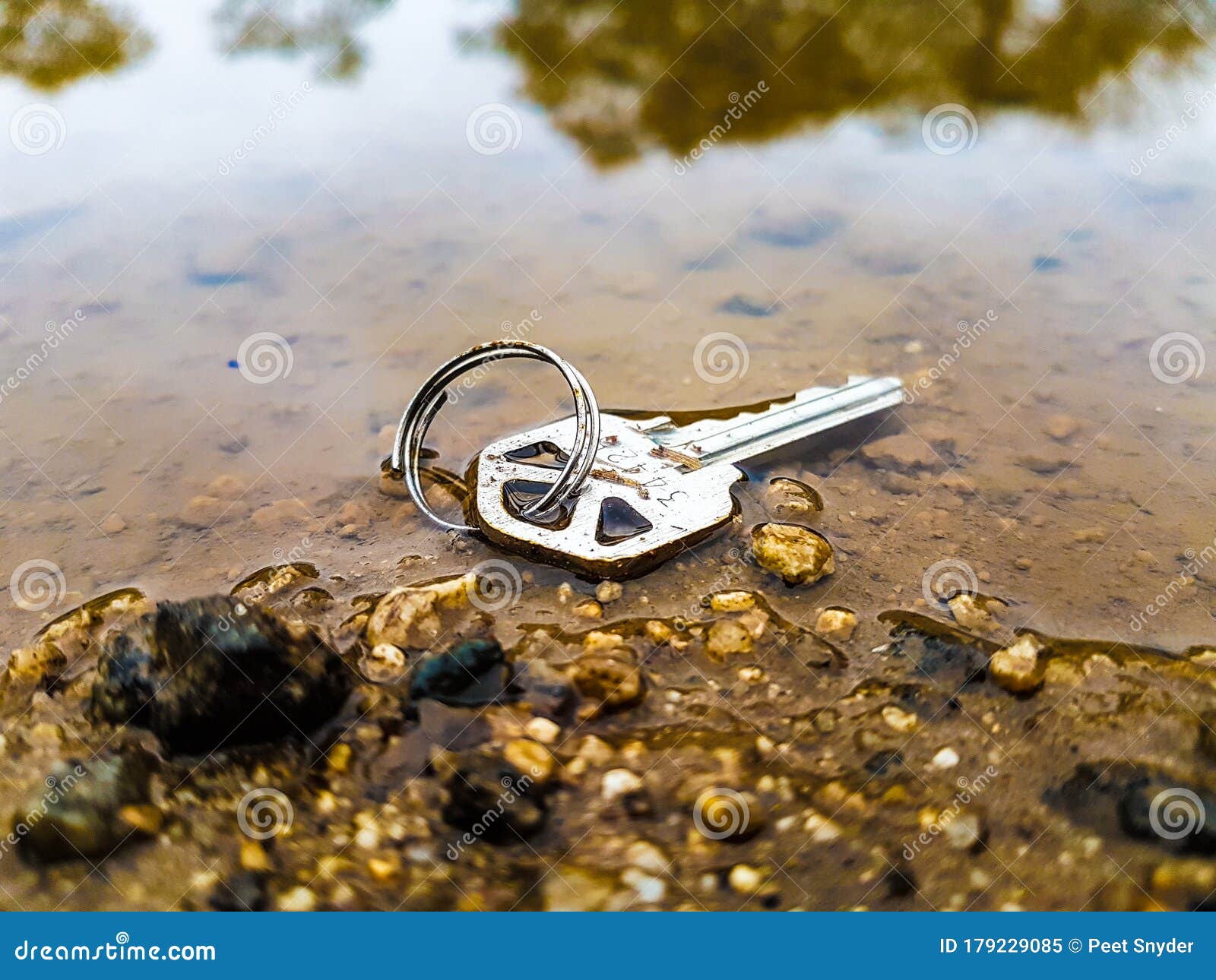 Lost key in some water stock image. Image of silver - 179229085