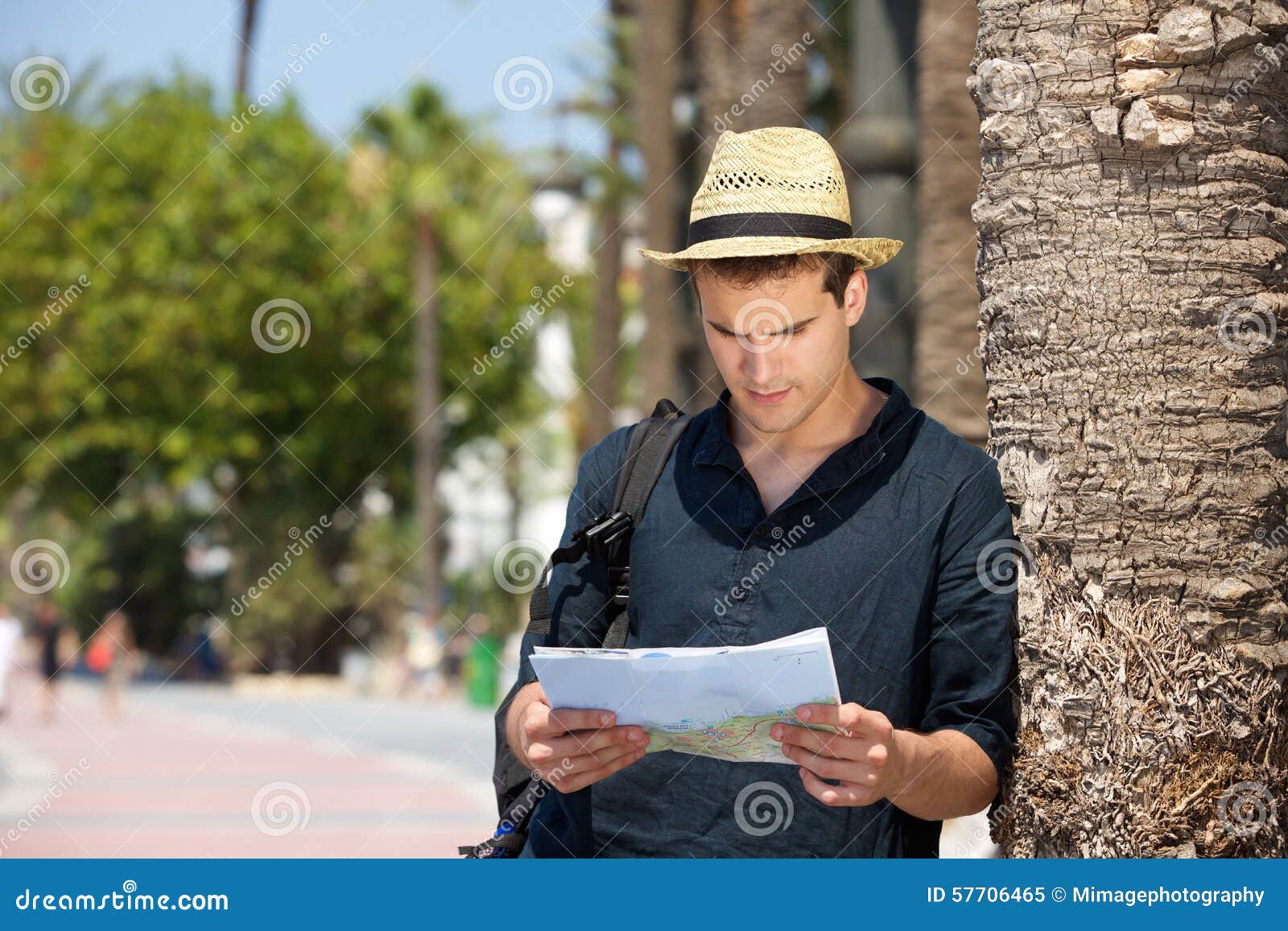 Lost Man with Map and Bag Standing Outside Stock Image - Image of ...
