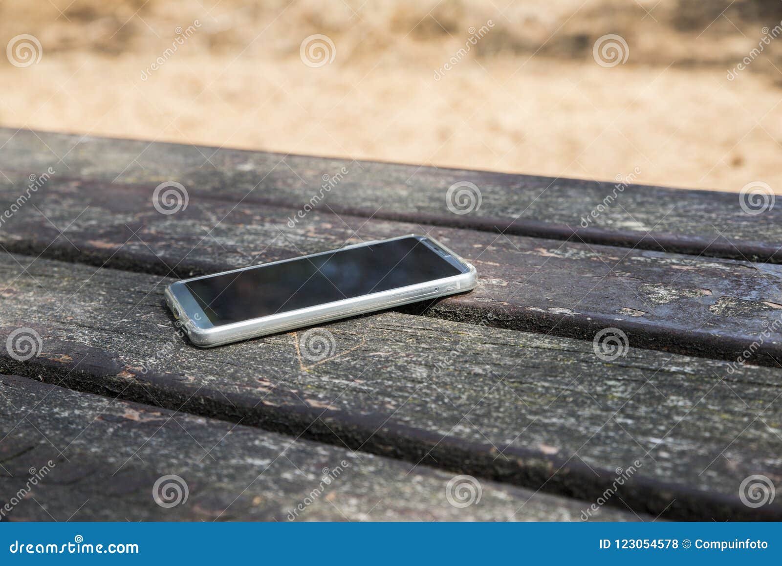Lost moblie phone stock photo. Image of wood, walk, bench - 123054578