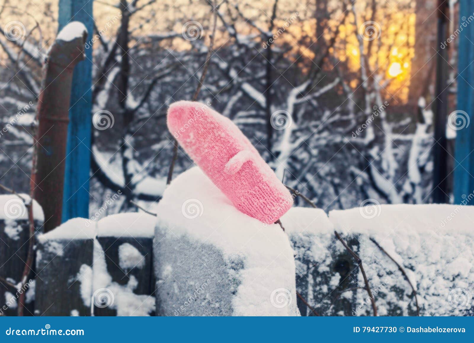 Lost pink glove on fence stock photo. Image of fence - 79427730