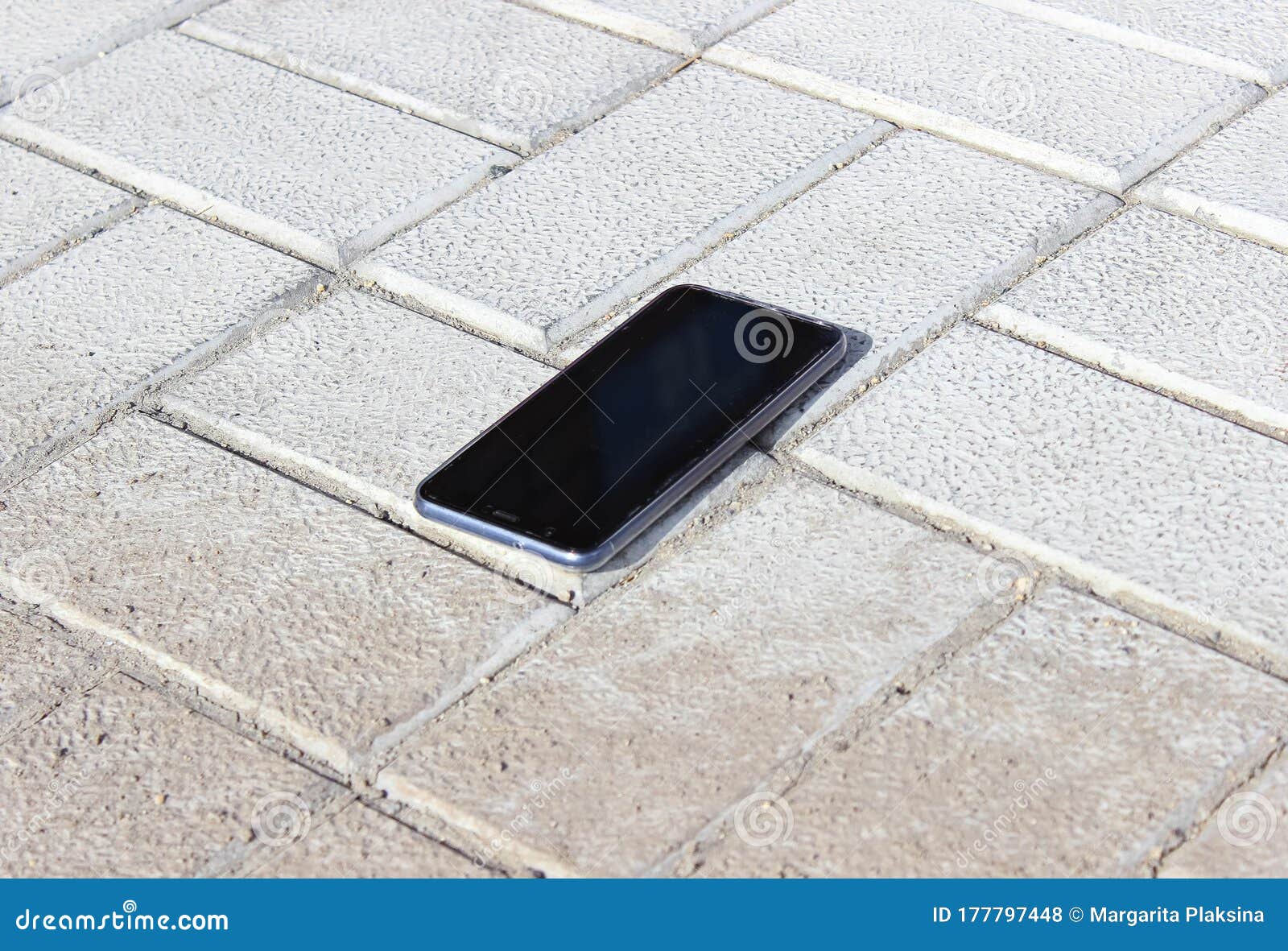 The Lost Smartphone is Lying on the Sidewalk Stock Photo - Image of ...
