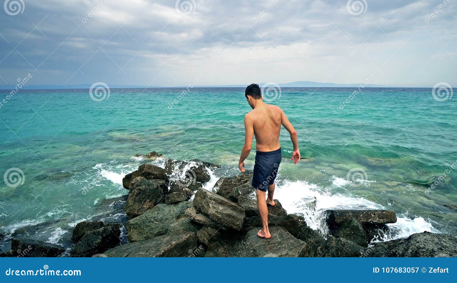 Lost Teen Standing on Sea Rock and Navigating Horizon Stock Image ... Lost Teen Standing on Sea Rock and Navigating Horizon Stock Image ...
