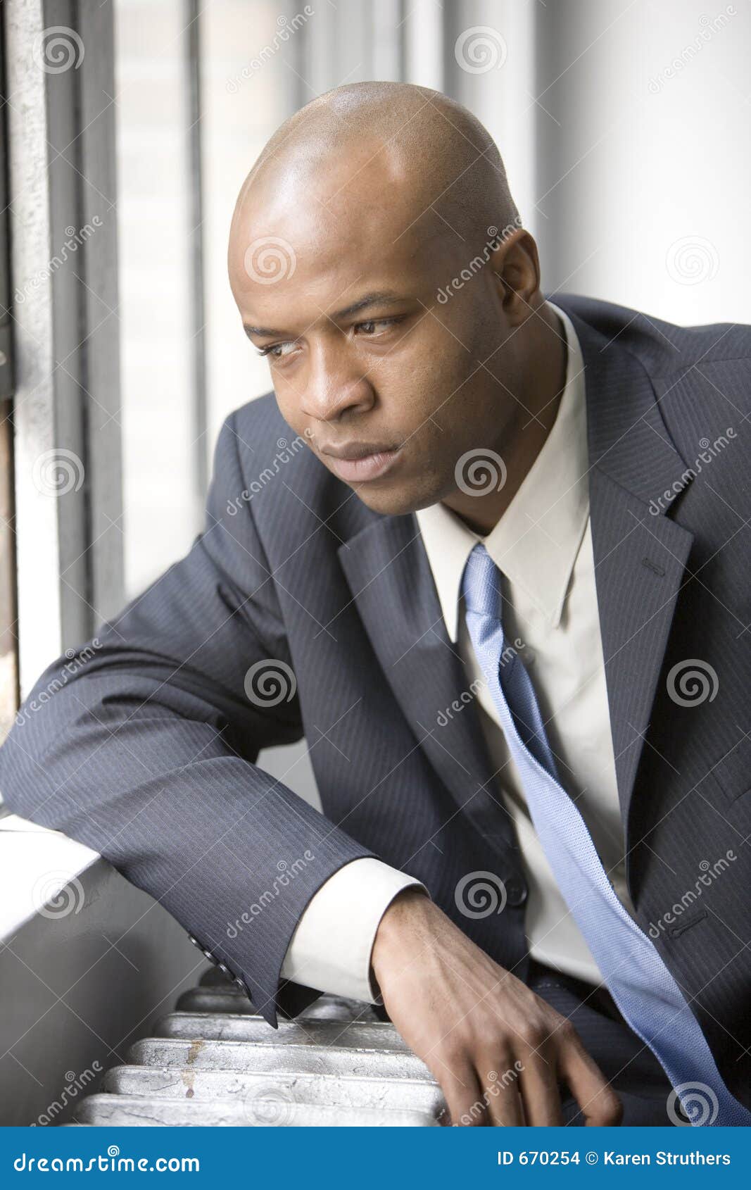 Lost in thought stock photo. Image of daylight, bald, african - 670254