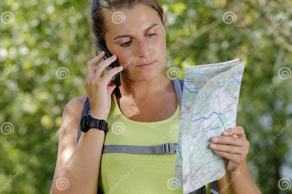 Lost Tourist Checks Map while Calling for Help Stock Photo - Image of ...