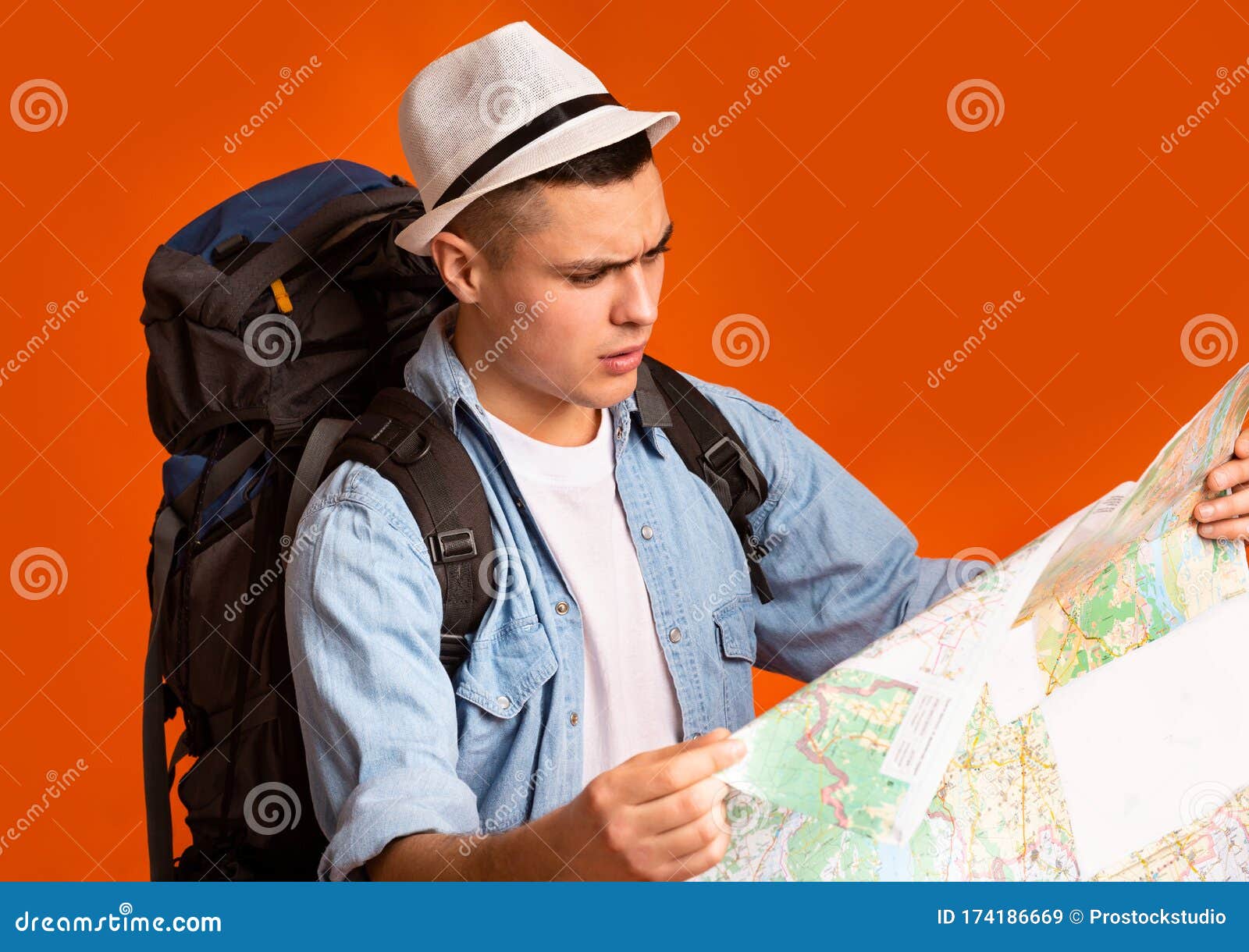 Lost Traveler with Backpack Looking at City Map Stock Image - Image of ...