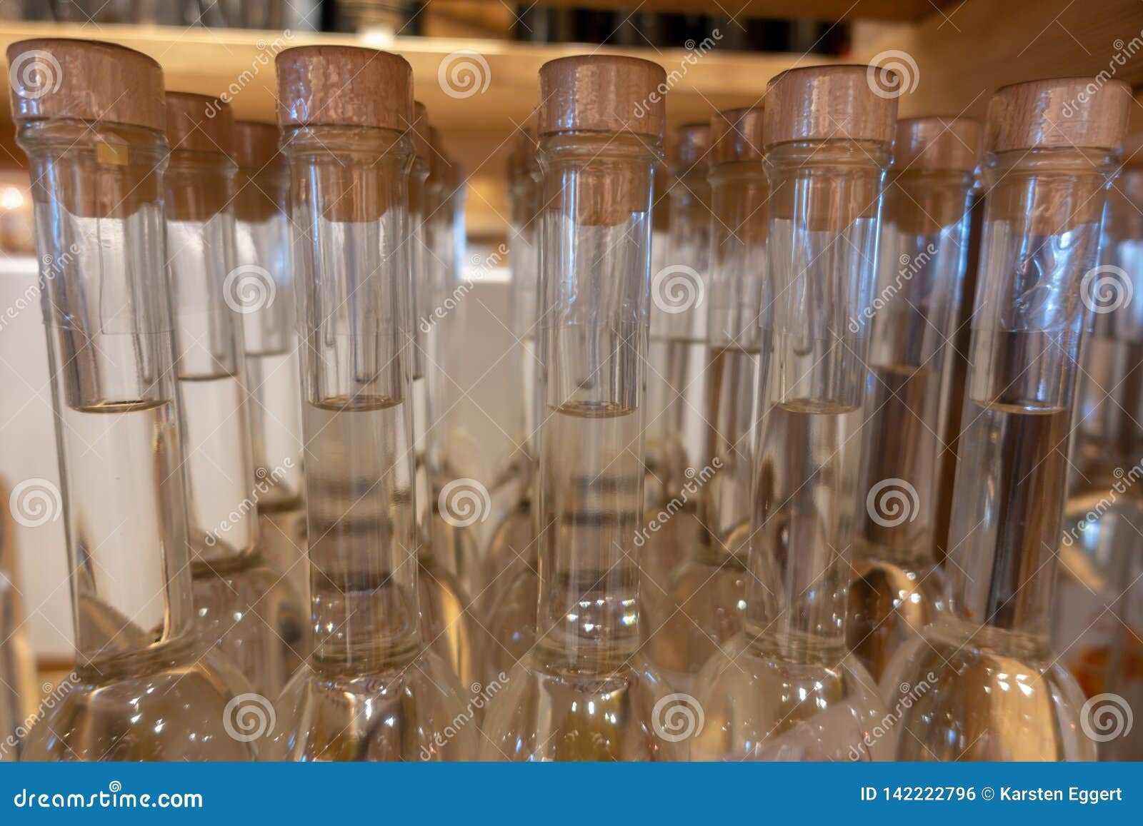 Lot of Alcohol Bottles in a Shelf Stock Photo - Image of corks, glass ...