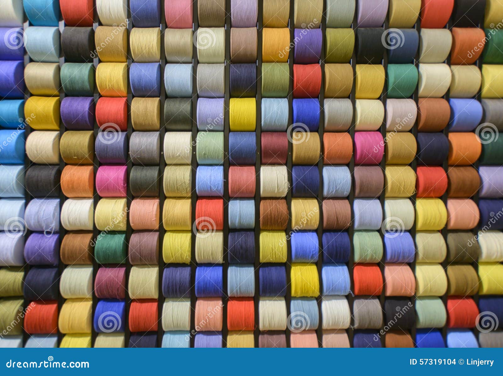 A Lot of Bobbins of Different Threads As a Background Stock Photo ...