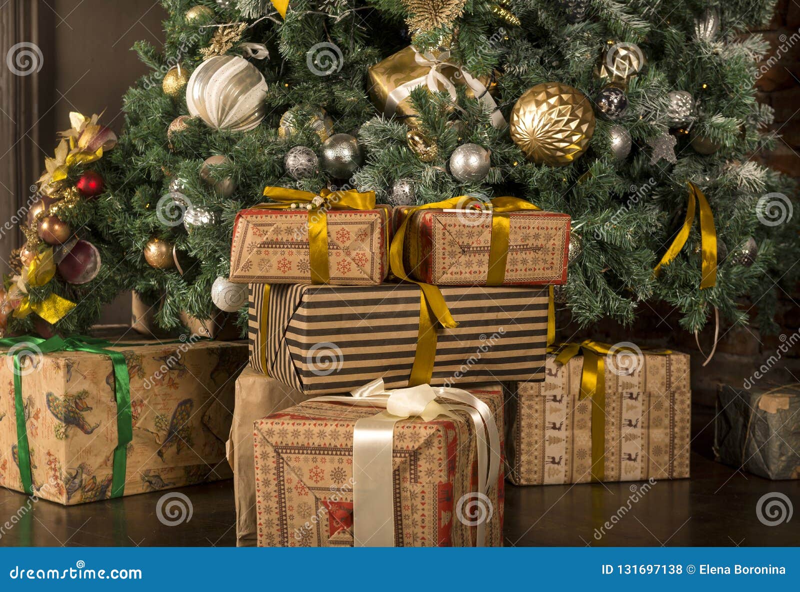 Lot of Boxes with Gifts in a Gift Box Under the Decorated Christmas ...