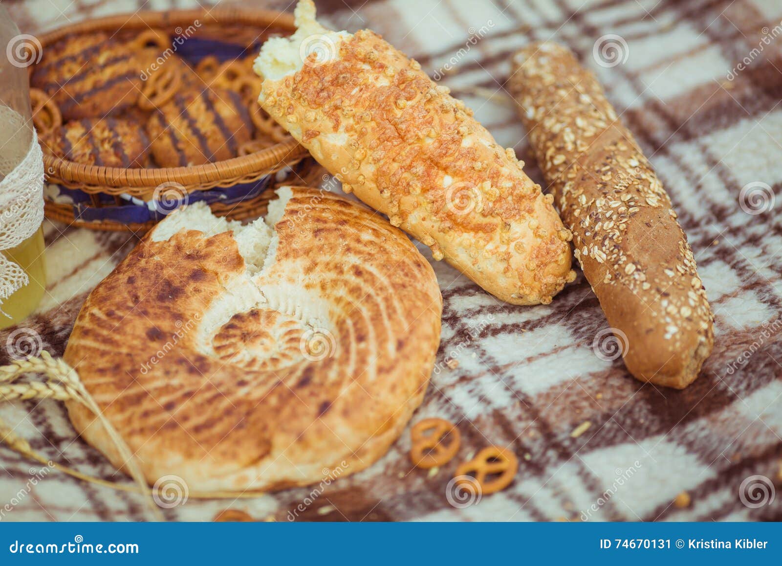 A Lot of Bread on a Plaid in Outdoors Stock Image - Image of close ...