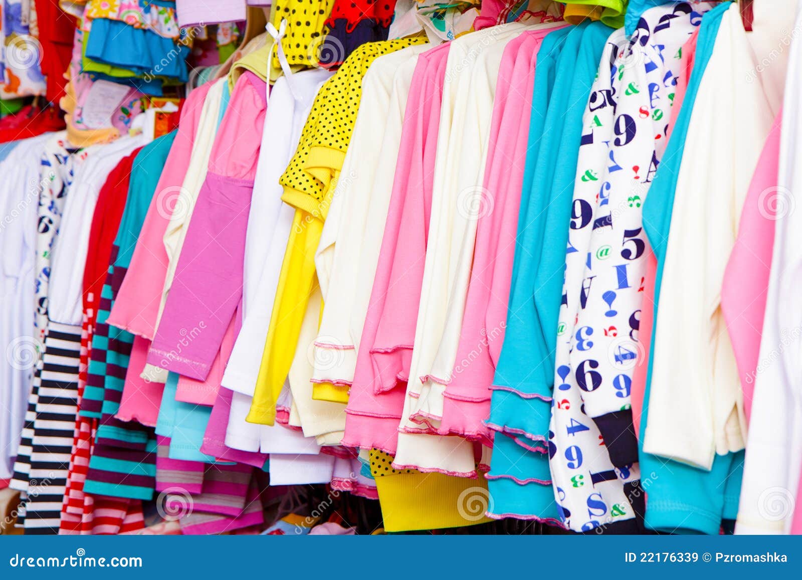 A Lot of Clothes on a Hanger Stock Image - Image of mixed, choice: 22176339