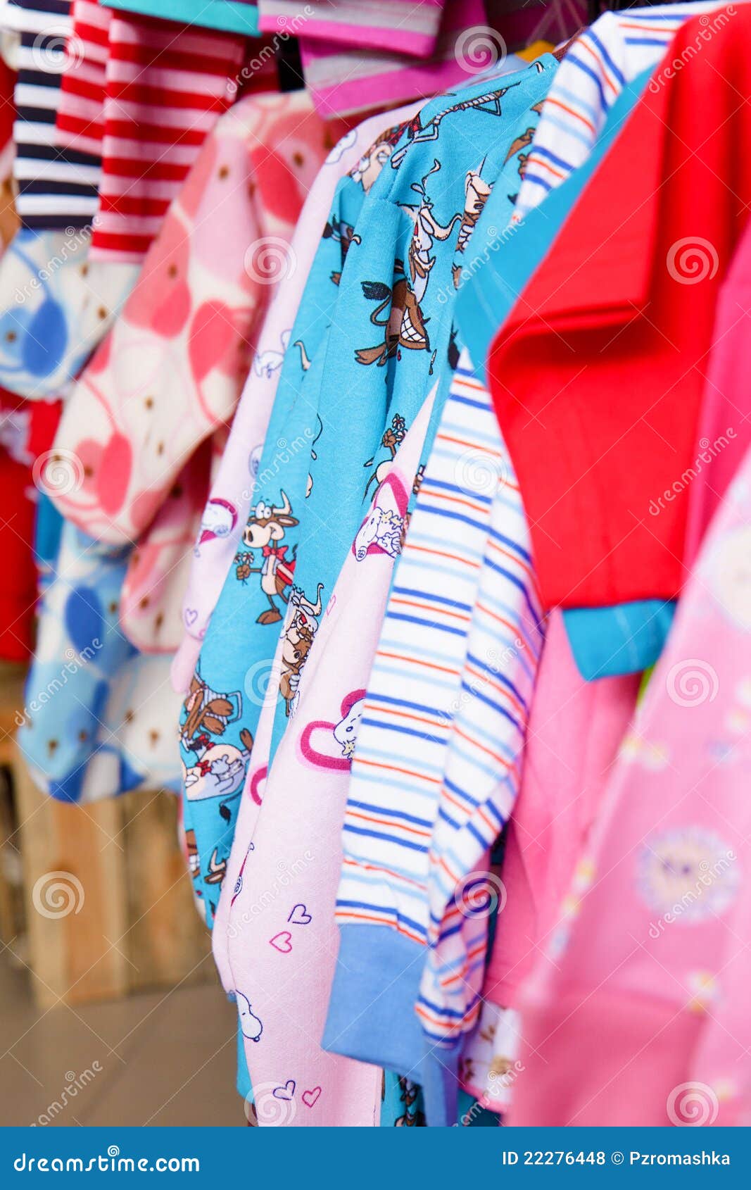 A Lot of Clothes on a Hanger Stock Photo - Image of multicolored ...