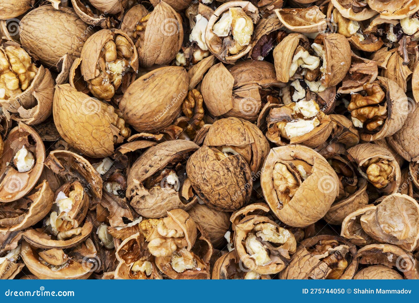 A Lot Crushed Walnuts with Skin, Background, Texture. Stock Photo ...