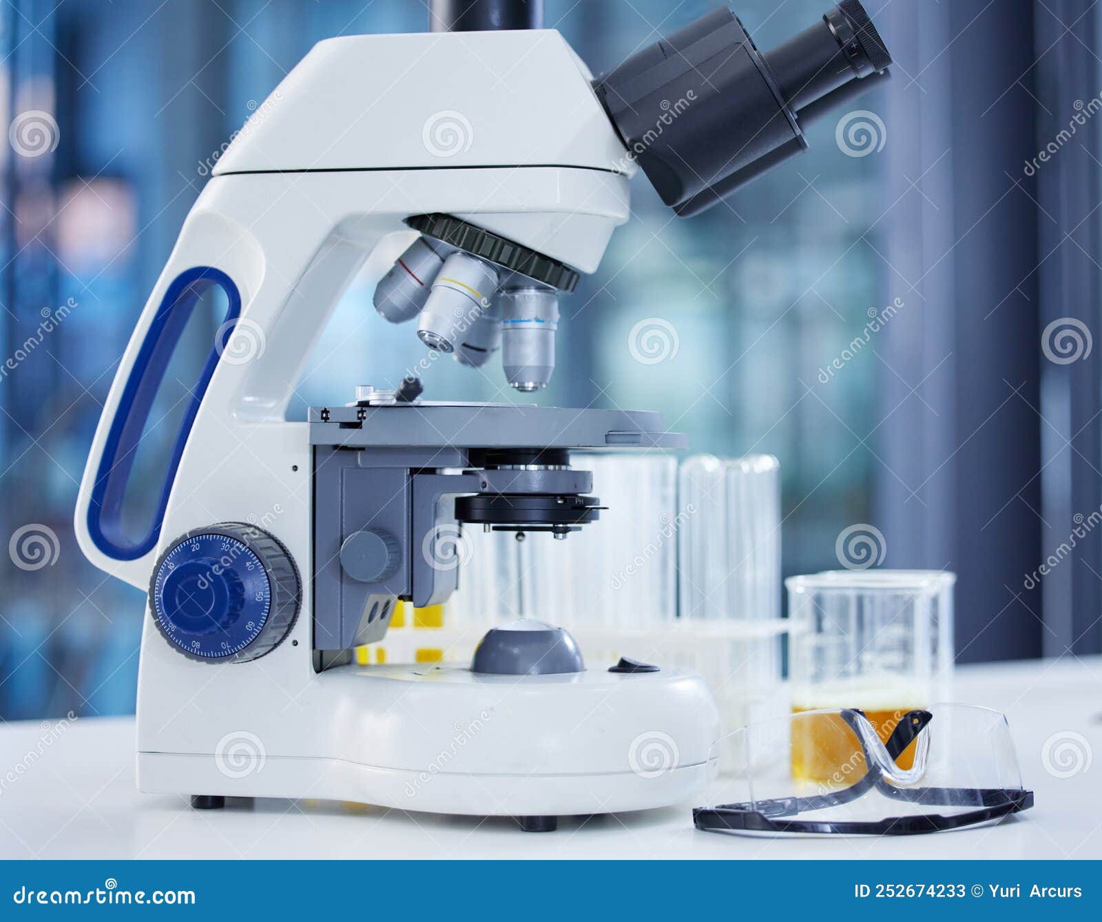 A Lot of Dedication Goes into Making New Discoveries. a Microscope and ...